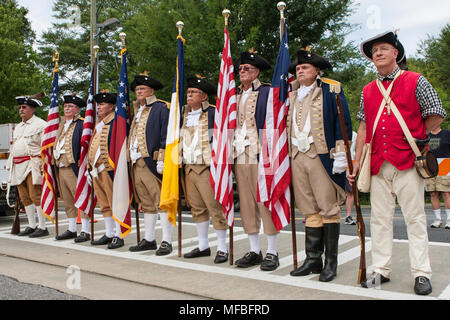 Soldiers in a color guard present the colors during a change of command ...
