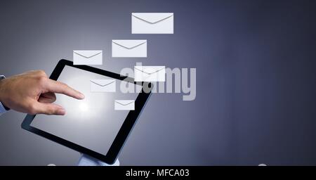 Envelope letter messages and hand using tablet Stock Photo - Alamy