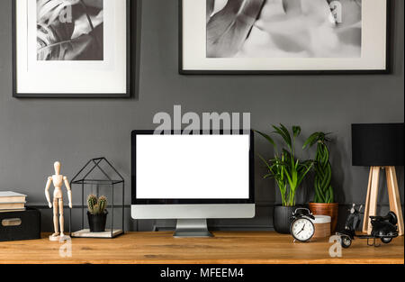 Empty work desk in home office with white wall and pencils and ...