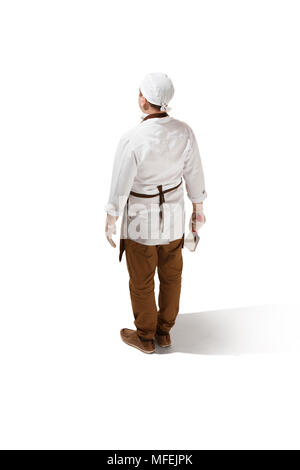 Serious butcher posing with a cleaver isolated on white background ...