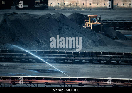 Taranto. ILVA steel factory, mineral site. Italy Stock Photo - Alamy