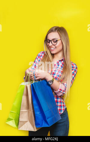 Photo of young joyful woman with shopping bags Stock Photo - Alamy