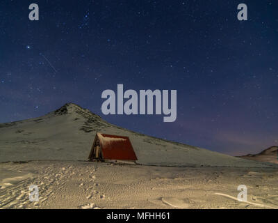 Emergency hut at night Stock Photo - Alamy