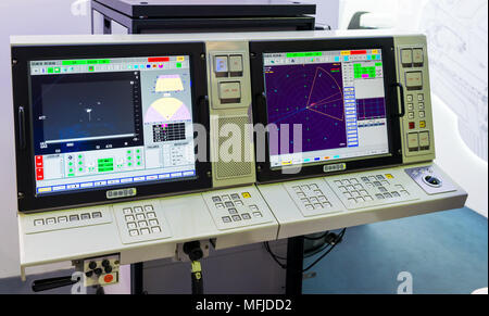 Modern ship control panel with engine accelerator and red trackball ...