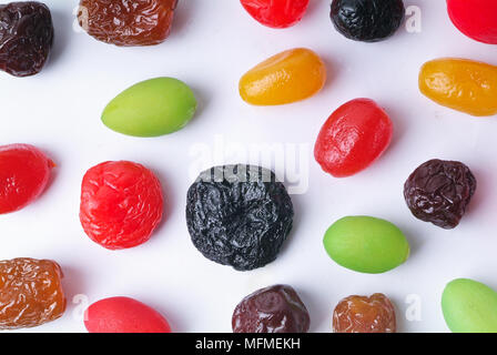 Dried prunes fruits (Preserved fruits Chinese plum) in wooden bowl ...