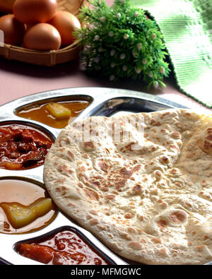 Roti canai, roti tisu, traditional south indian fried bread Stock Photo ...