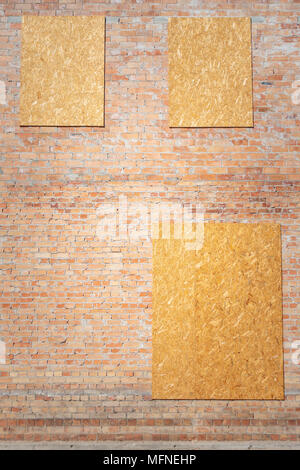 Unfinished concrete and red brick building project under construction ...