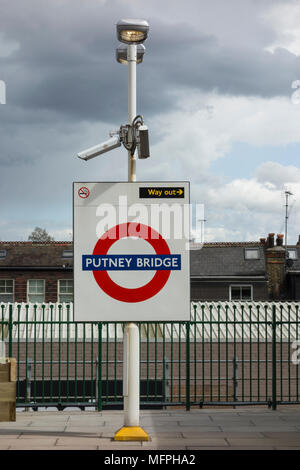 Putney Bridge Station signage and surveillance cameras, London, UK ...
