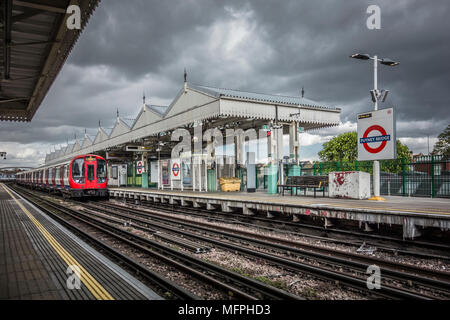 Putney Railway Bridge and district line tube train and view of River ...