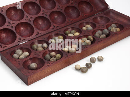 Awale, African Game against White Background Stock Photo - Alamy
