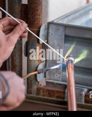 Welding of copper pipe of a methane gas pipeline or of a conditioning ...
