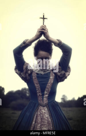 Contemplative woman praying to God. Person prays to divinity with HOPE and FAITH Stock Photo - Alamy