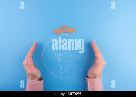 paper lorry on the earth planet. delivery concept Stock Photo - Alamy