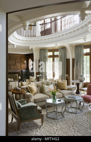 Upholstered seating in spacious opulent sitting room with atrium Stock ...
