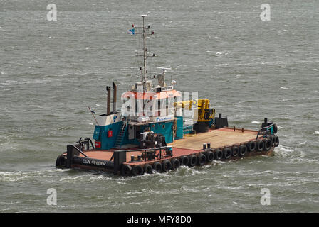 tug boat with yellow funnel Stock Photo - Alamy