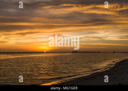 Boca Grande FL Sunset,with silhouette of the old Pier structure Stock ...