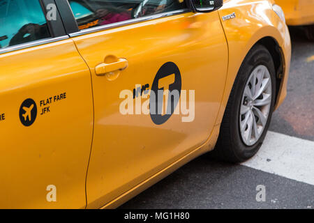 New York Medallion Yellow Taxi Cabs Line up at crossing on a rainy ...