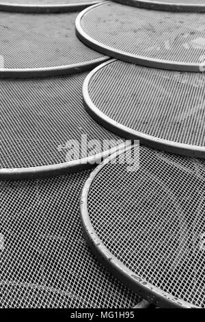 Metal tables over lapping Stock Photo - Alamy