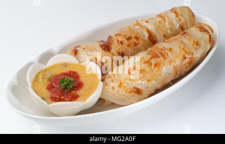 Roti canai, roti tisu, traditional south indian fried bread Stock Photo ...