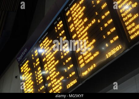 Train destination board with departure times and platform number, and ...