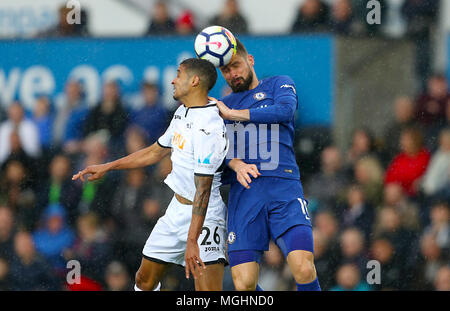 Chelsea's Olivier Giroud (left) and Swansea City's Alfie Mawson battle ...