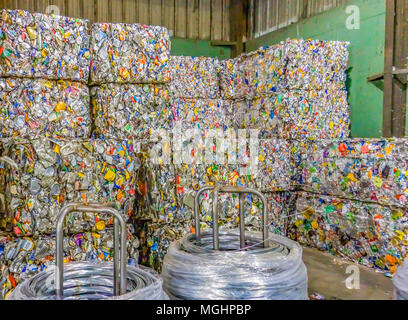Baled aluminum and metal cans at recycling center Stock Photo - Alamy