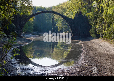 19th century Fairy tale Devil's Bridge (Rakotzbrücke), Saxony, Germany ...