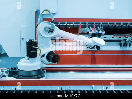 robot for metal forming process in Modern factory for industrial 4.0 ...