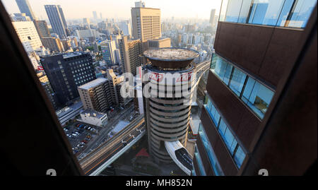 Osaka skyline with highway through its building at night, Japan Stock ...