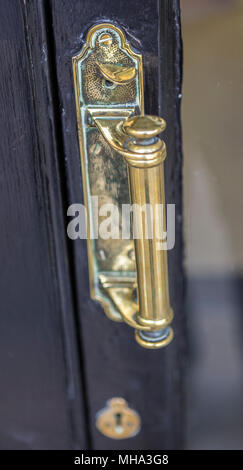 Polished brass door handle latch of a Pullman railway carriage Stock ...
