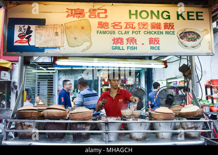 clay pot cooking at a street vendor stall in Kuala Lumpur, Malaysia ...