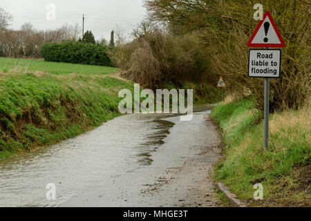 british road liable to flooding road sign with exclamation mark above ...