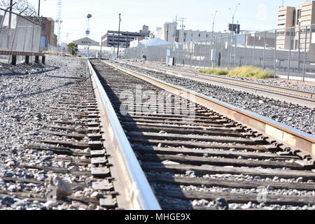 A long metal train tracks at a monorail station Stock Photo - Alamy