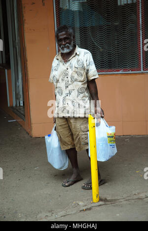 Old man with shopping bags, Sigatoka, Fiji Stock Photo - Alamy