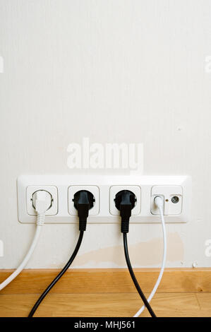 Electric and aerial outlet sockets, electric plugs and cables Stock ...
