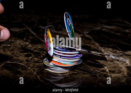 Colorful POGS of various cartoon characters Stock Photo - Alamy