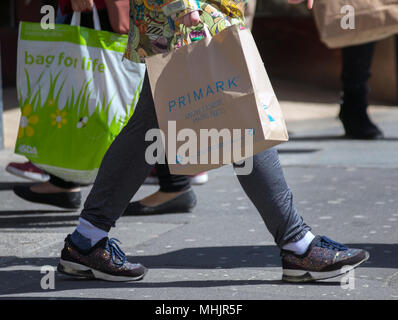Shoppers with Primark reusable bags of store purchases at Houndshill ...