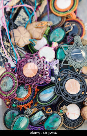 collection of natural stone handmade pendants Stock Photo - Alamy