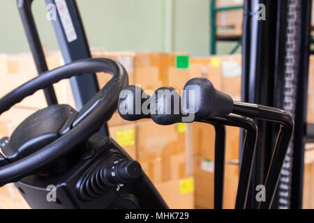 The lever hydraulic system of forklifts Stock Photo - Alamy