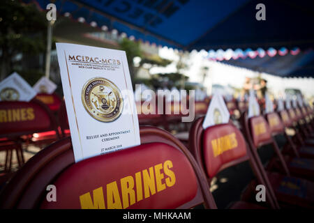 Sgt. Maj. Peter A. Siaw, right, accepts the non-commissioned officer’s ...
