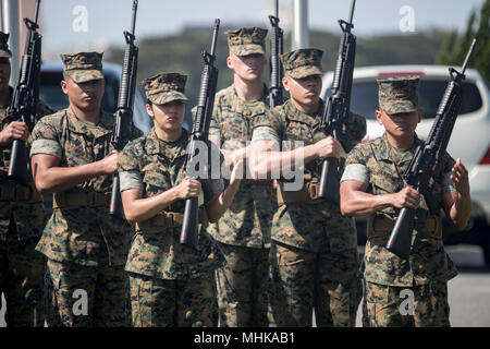 Sgt. Maj. Peter A. Siaw, right, accepts the non-commissioned officer’s ...