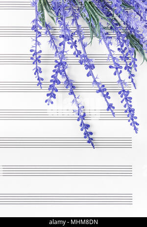 Lavender and paper music notes on old wooden background in vintage ...