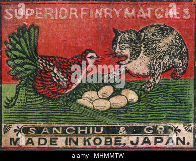 Old Japanese Matchbox label with a cat and a dog in a hat Stock Photo ...