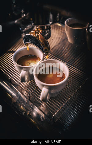 An automatic coffee machine makes delicious scented coffee Stock Photo ...