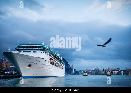 Sydney ferries and cruise ship Rhapsody of the Seas moored at Circular ...
