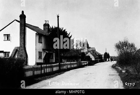Scene in the village of Little Dunmow, Essex, with a pub sign on the ...