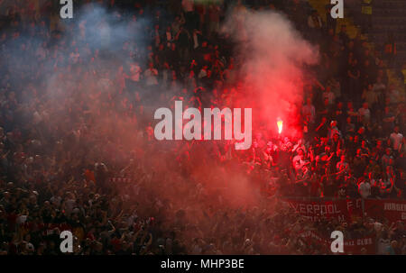 Liverpool fans light flares in the stands during the UEFA Champions ...