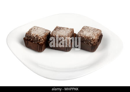 Chocolate cube shaped cookies powdered with sugar Stock Photo - Alamy