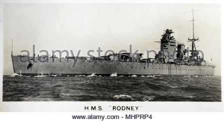 British battleship HMS Rodney of the Royal Navy firing her secondary ...