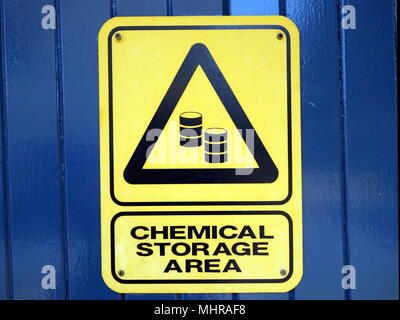 Warning sign chemical storage area installed at chemical storage room ...